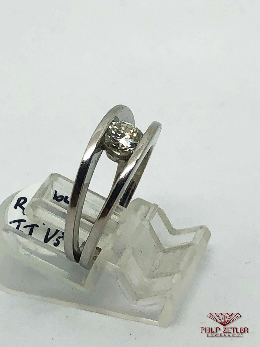 Modern Platinum and Diamond Millennium Tension Set Ring at Philip ...